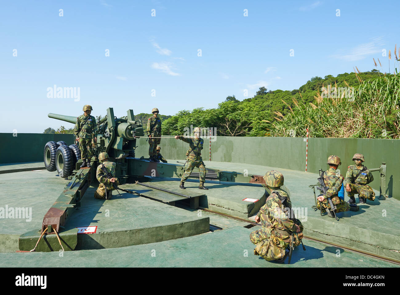 The Taiwan Military soldiers performing positional and firing drills on ...
