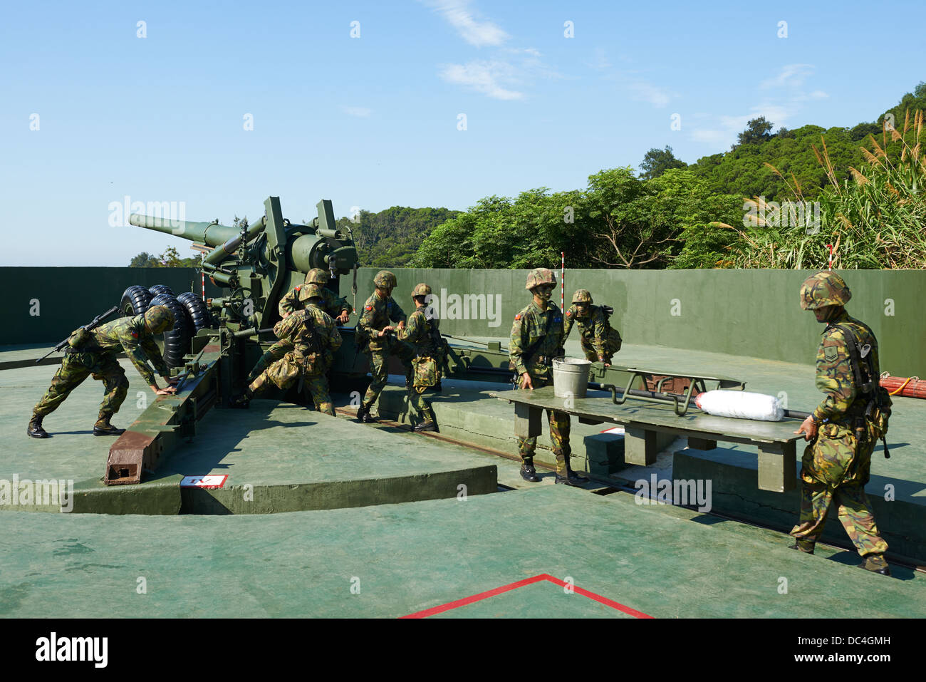 The Taiwan Military soldiers performing positional and firing drills on ...