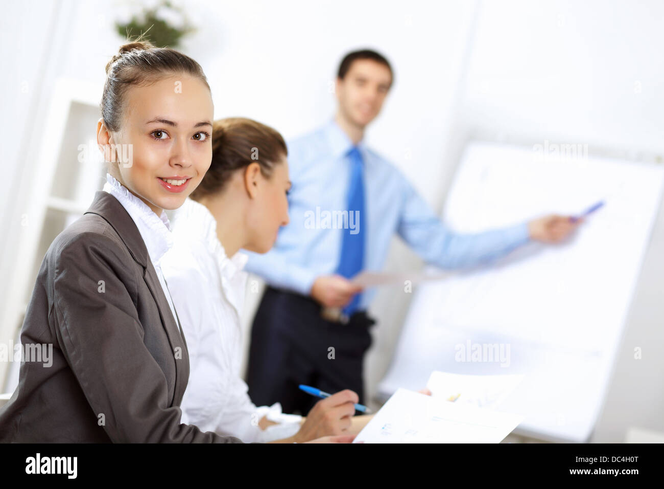 Young business people working together Stock Photo - Alamy