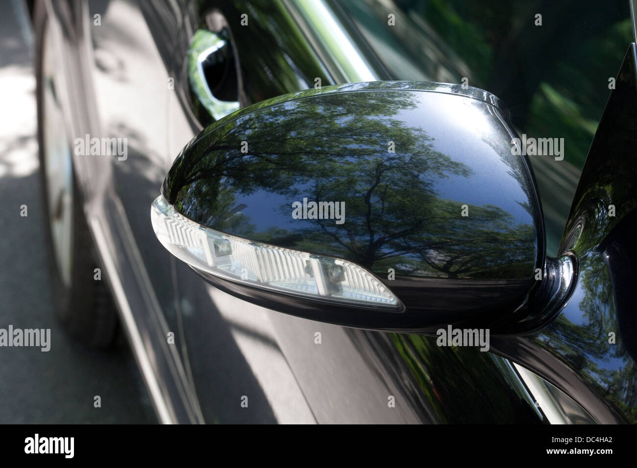 Rear view mirror of car Stock Photo - Alamy