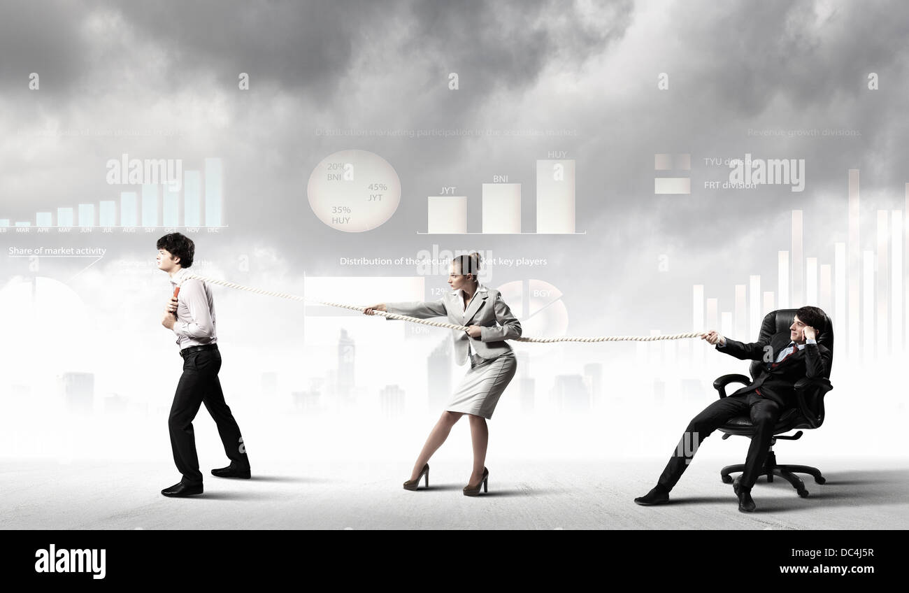 Three business people pulling rope Stock Photo - Alamy