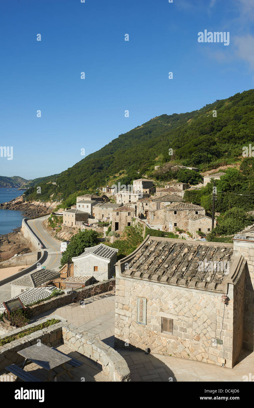 Tourists visit the Chinbe Village, a 19th century village containing ...