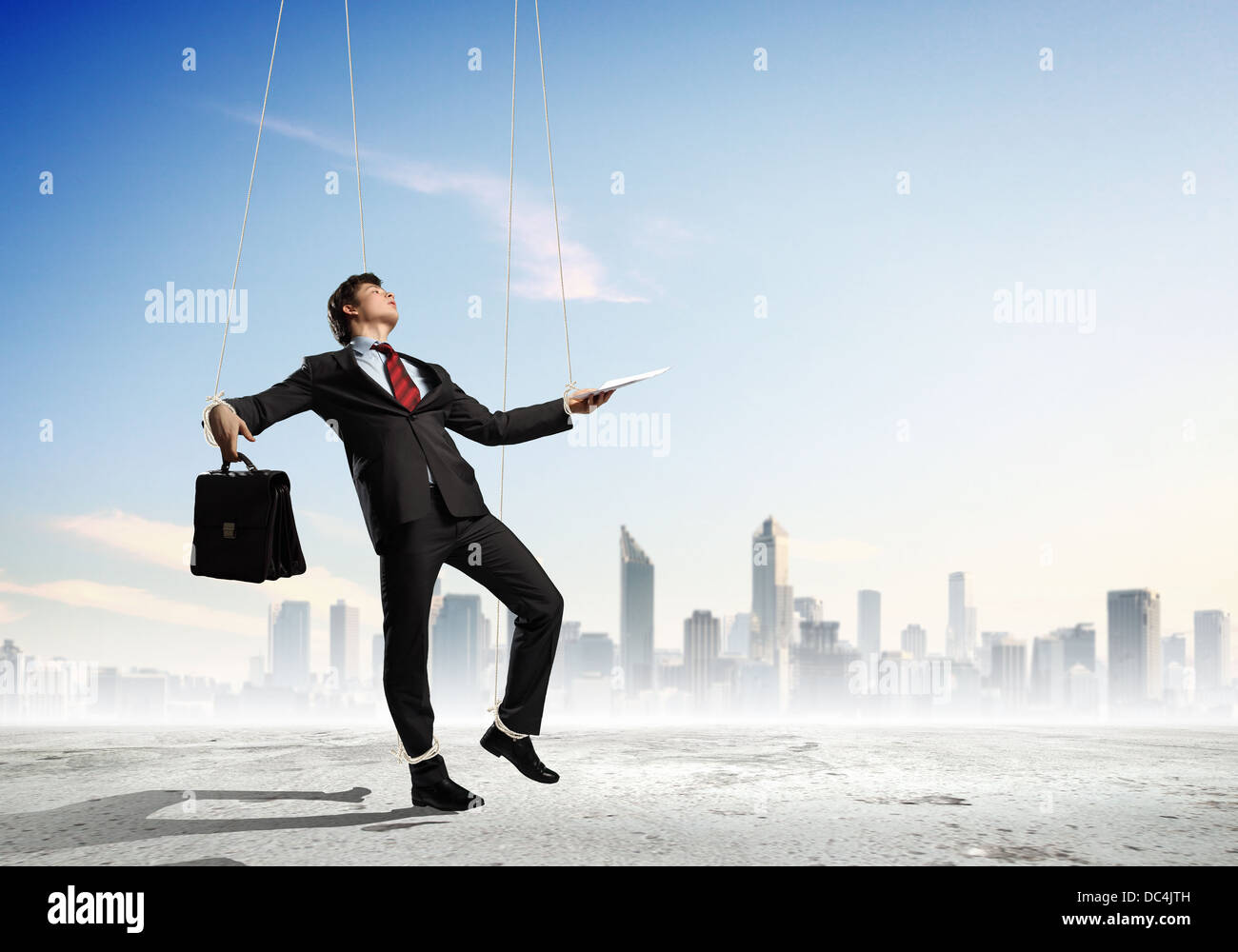 Domination boss puppet pulling hi-res stock photography and images - Alamy