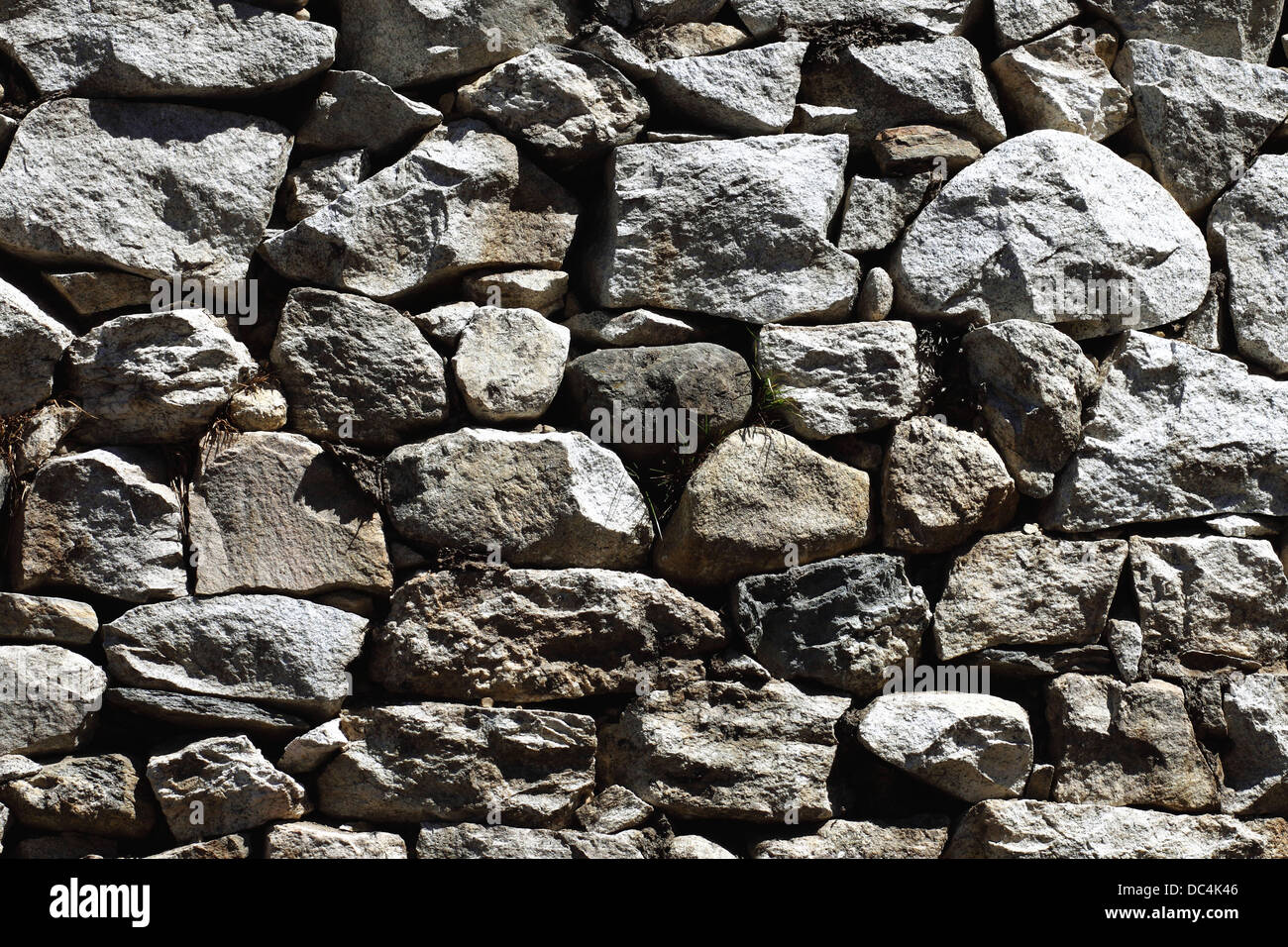 Natural pattern of a stone wall Stock Photo - Alamy