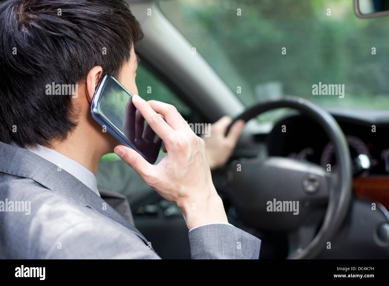 Car driving phone asia hi-res stock photography and images - Alamy