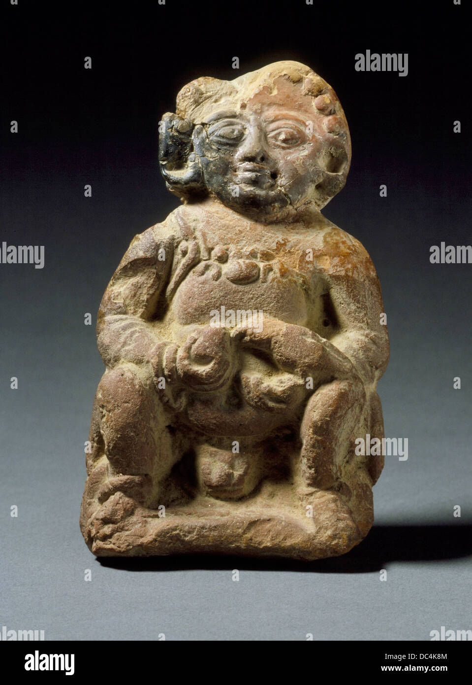 This artwork shows a boy feeding a parrot, with intricate detail ...