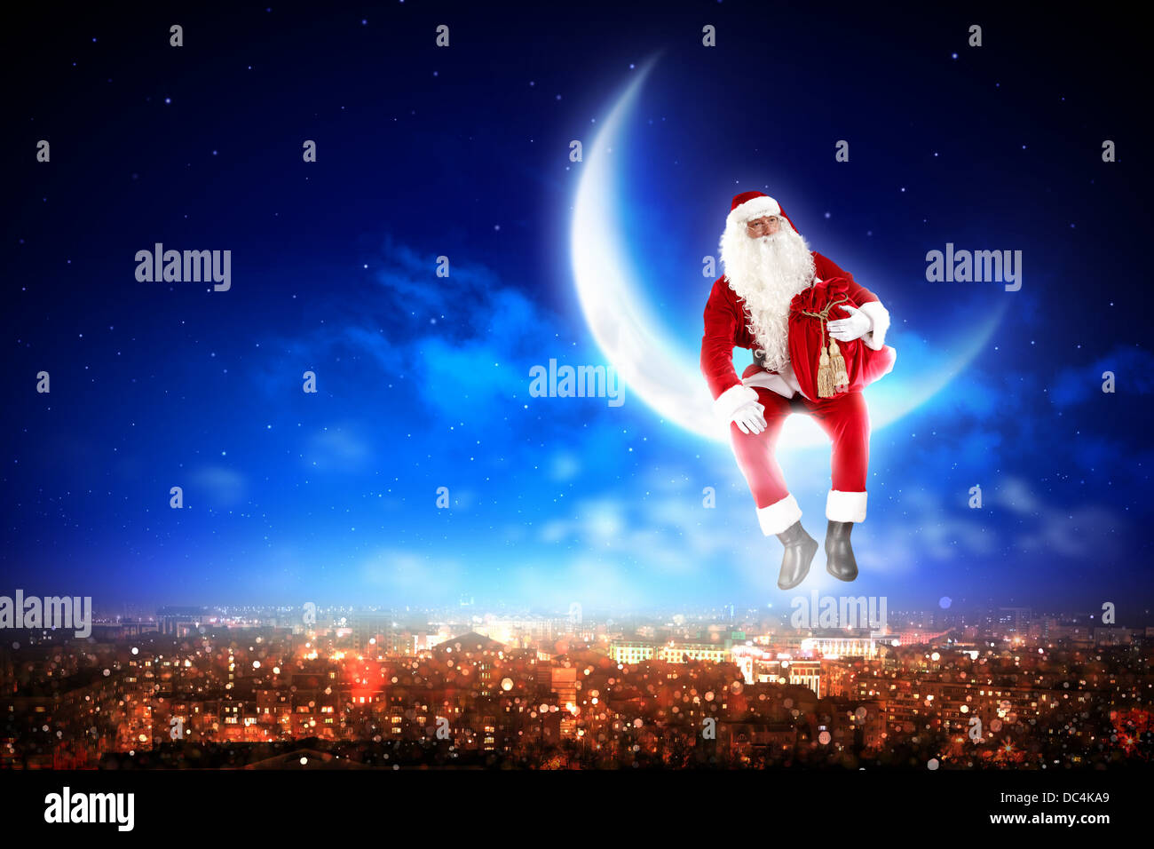 Santa on the moon Stock Photo - Alamy