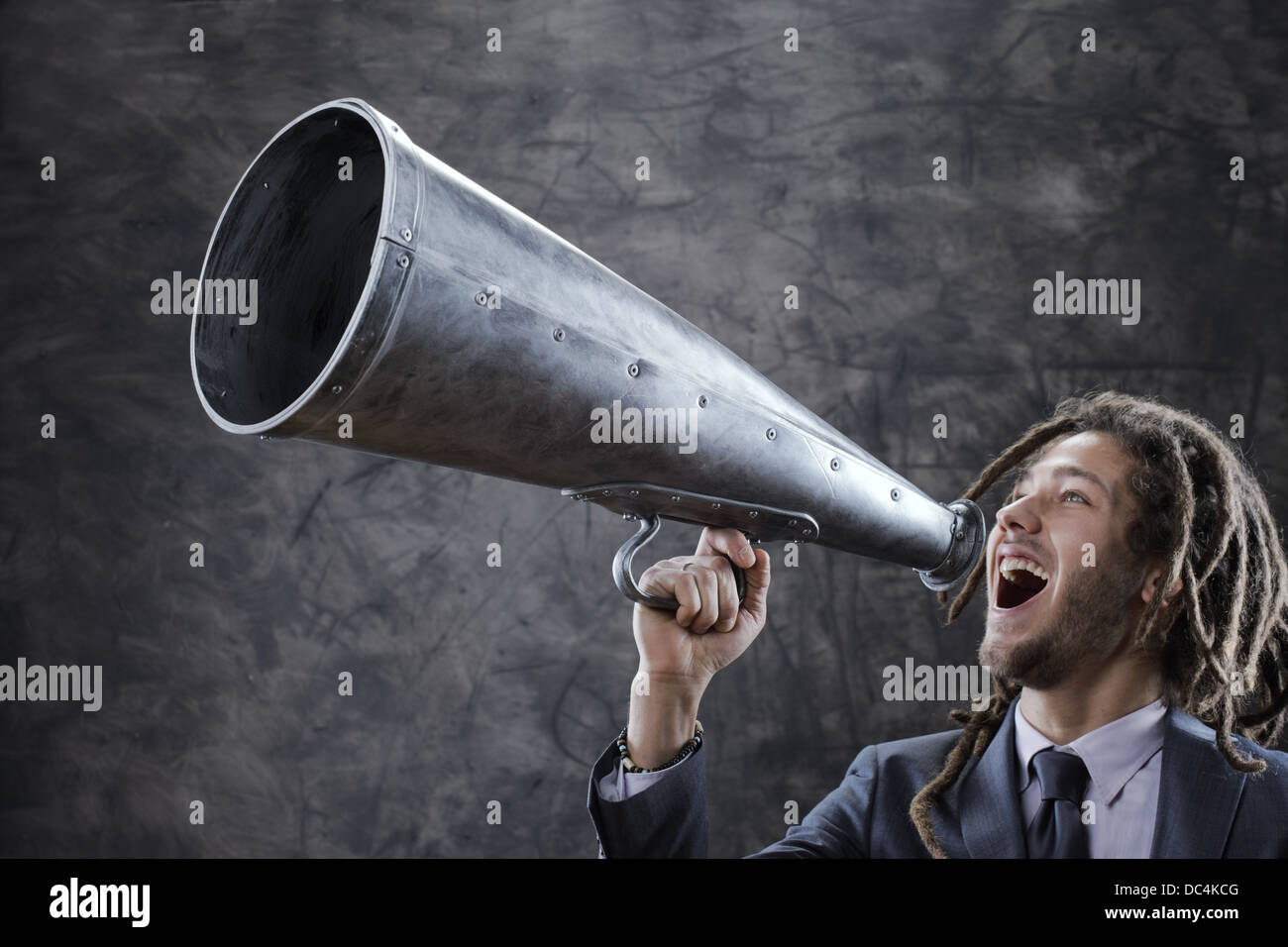 screaming into megaphone Stock Photo - Alamy