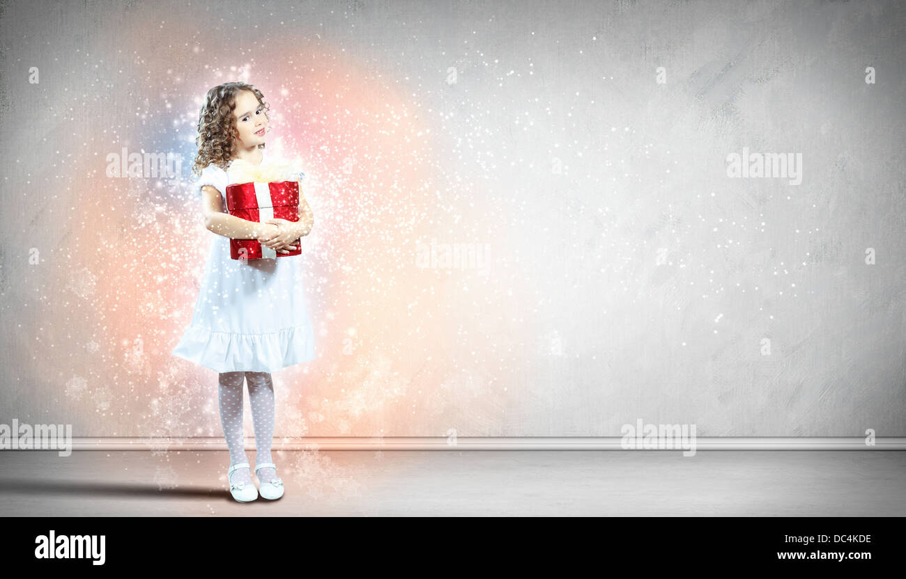 Happy girl opening gift box Stock Photo - Alamy
