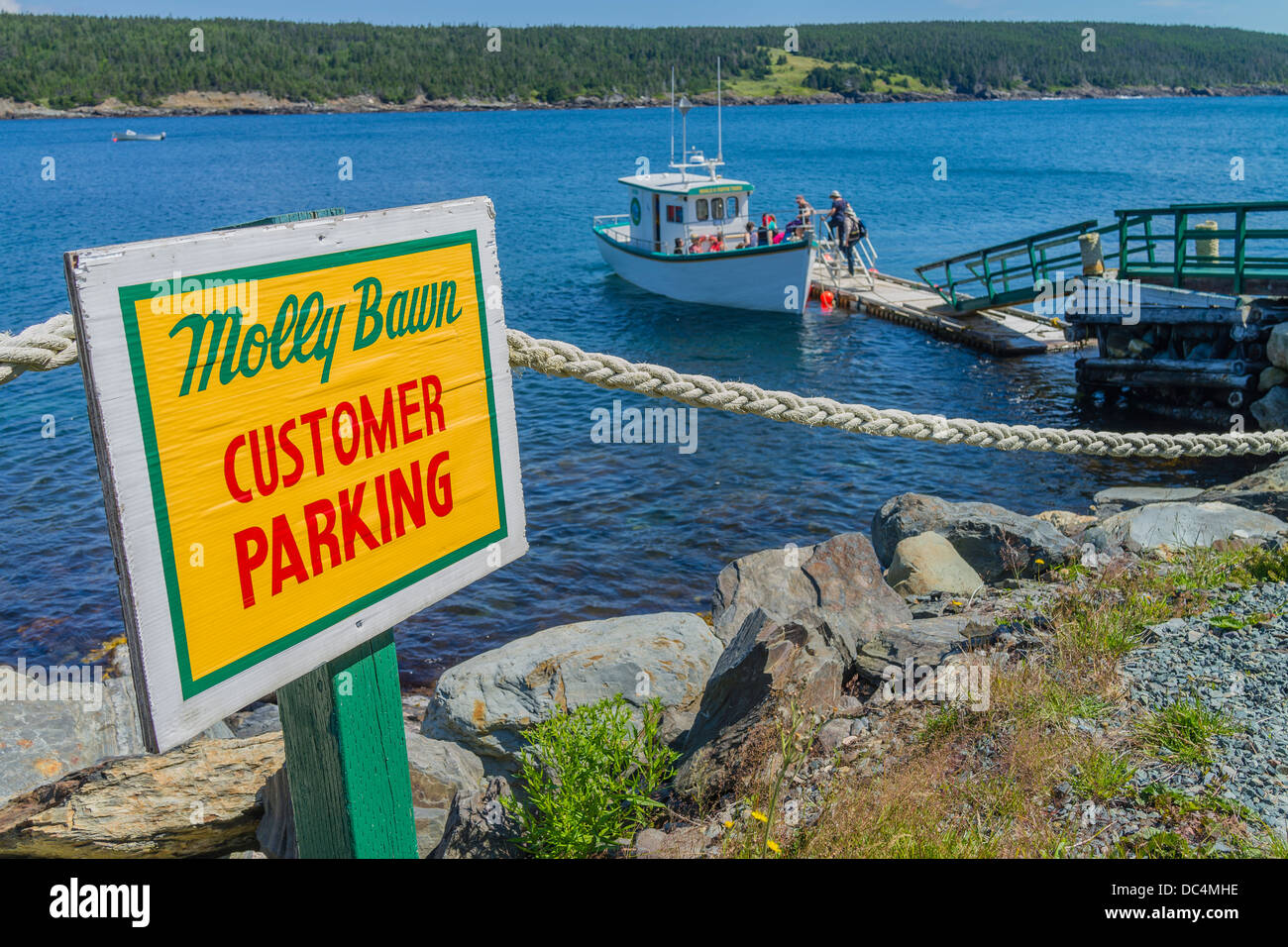 A view of the sign, the dock and the boat for Molly Bawn Whale & Puffin ...