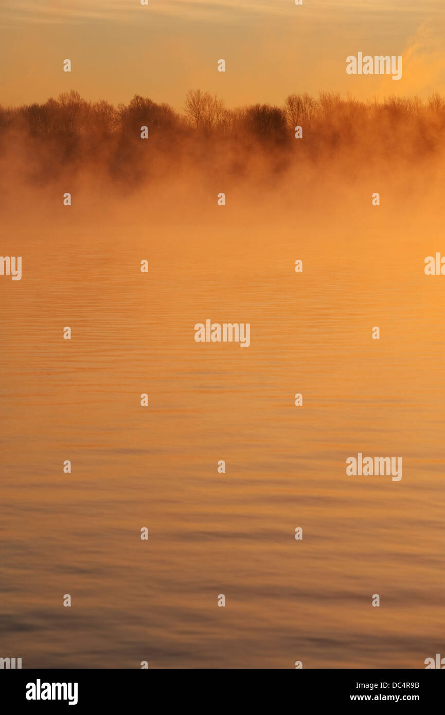 Winter sunrise with mist rising from the Saint Lawrence River Stock ...