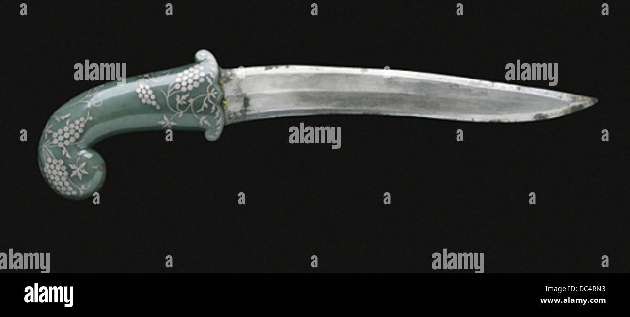 This dagger, known as a Khanjar, is paired with a sheath and is part of ...