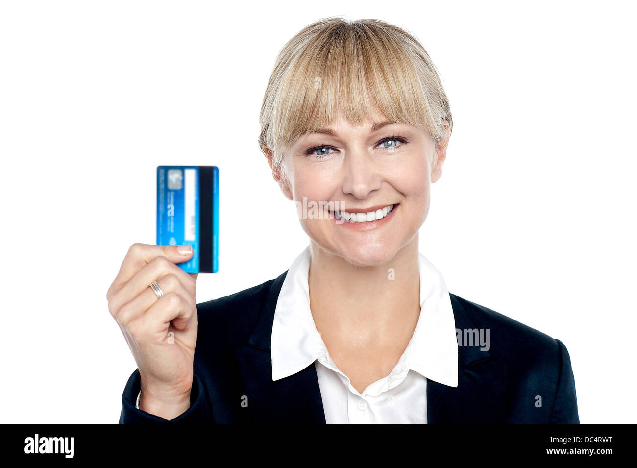 Joyous female employee showing credit card Stock Photo - Alamy