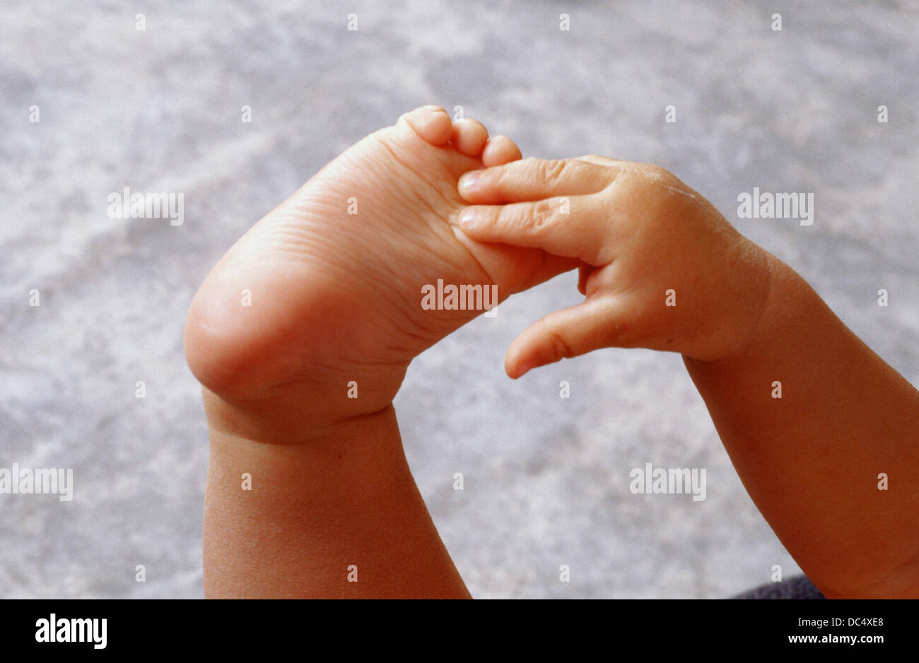 Baby hand leg stretch hi-res stock photography and images - Alamy