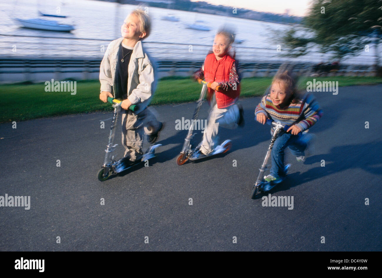 Kids On Scooters High Resolution Stock Photography and Images - Alamy