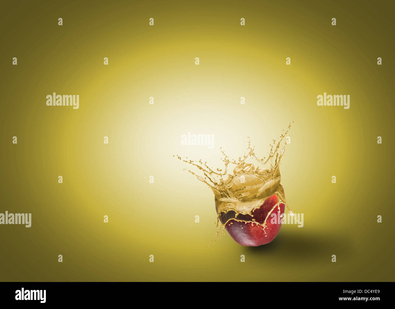 fresh juice pouring out of the apple Stock Photo - Alamy