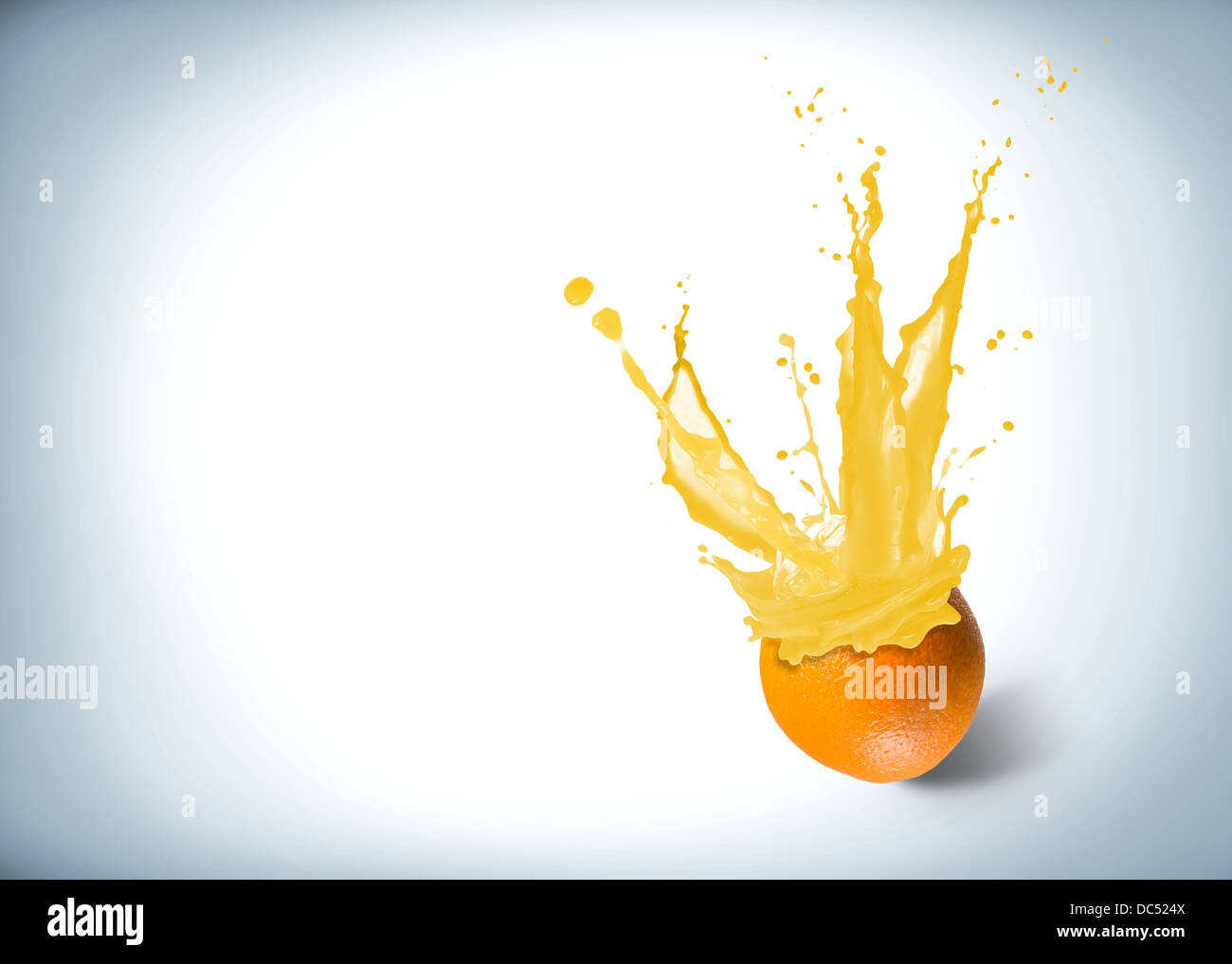 fresh orange juice with a splash Stock Photo - Alamy