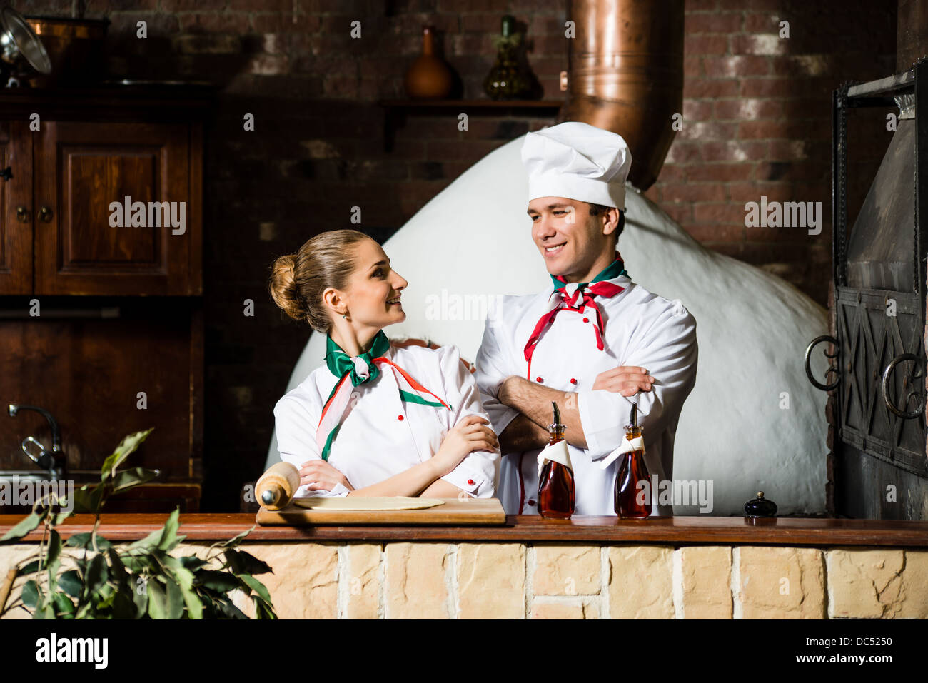 portrait of two cooks Stock Photo - Alamy
