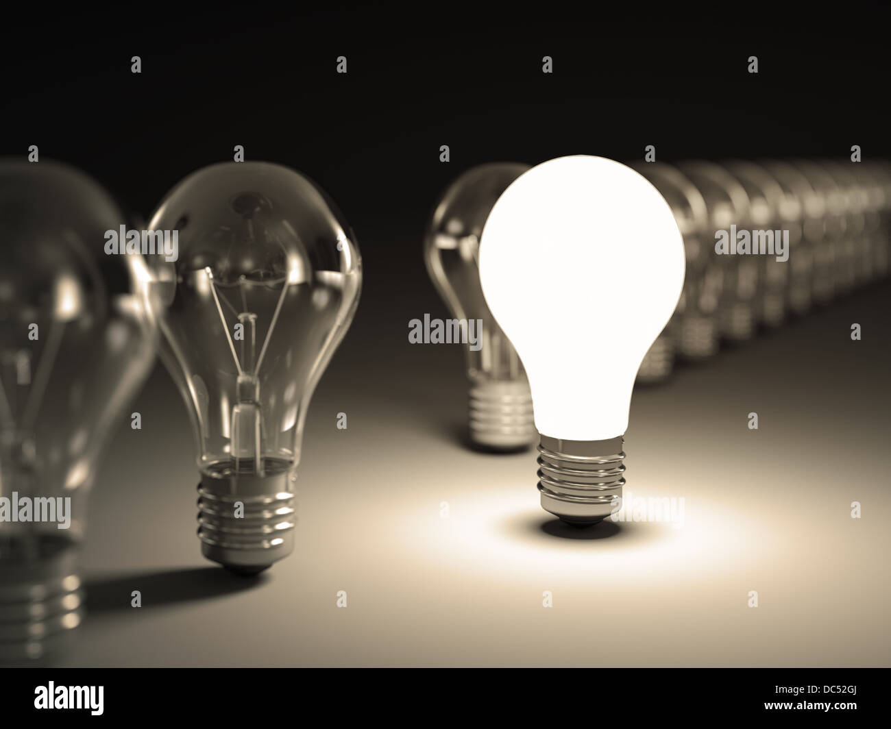 Light bulbs in a row with glowing one on black background Stock Photo ...