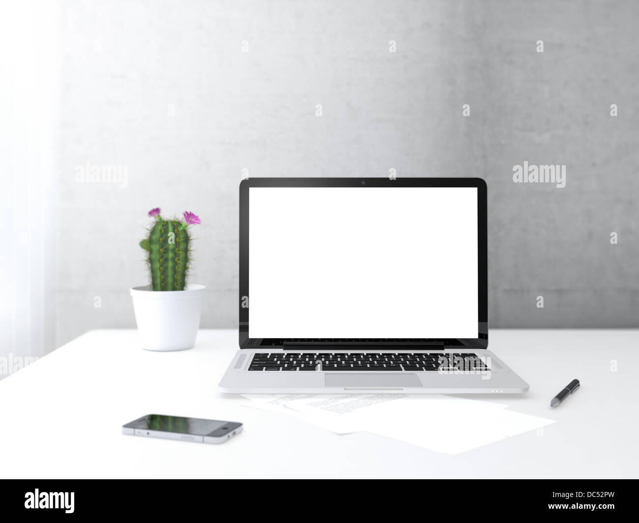 Place of work with electronic devices on desk next to the wall and ...