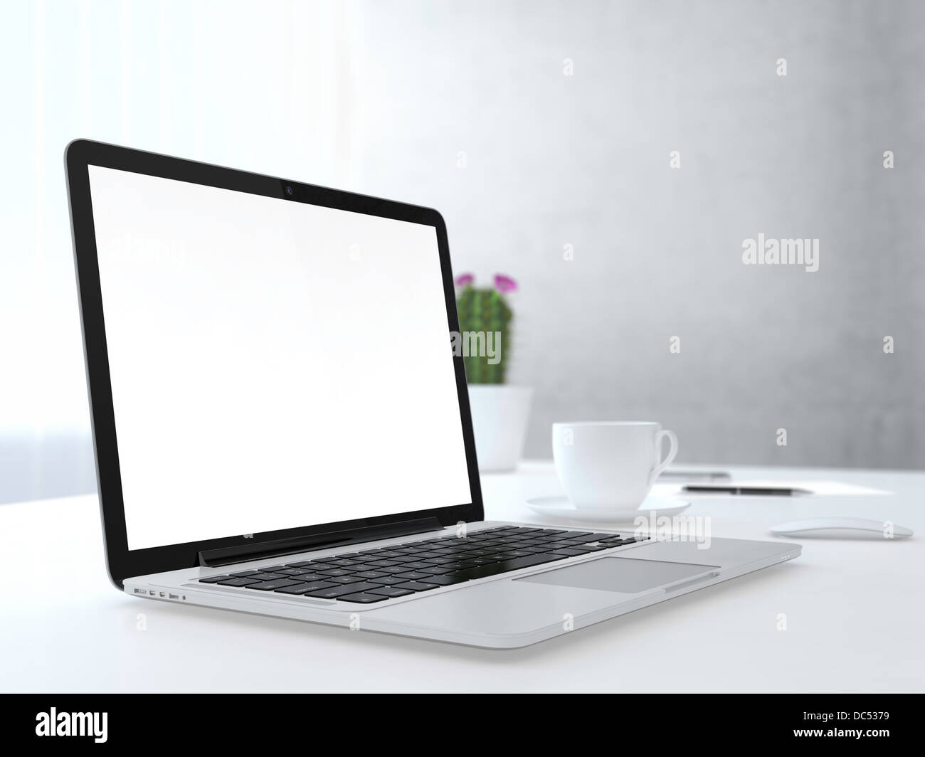 Place of work with electronic devices on desk next to the wall and ...