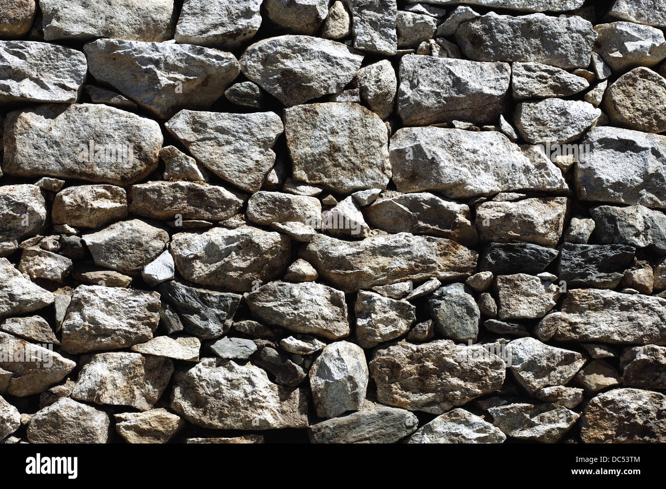 Natural pattern of a stone wall Stock Photo - Alamy