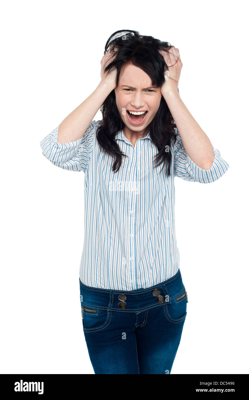 Frustrated young lady screaming loud Stock Photo - Alamy