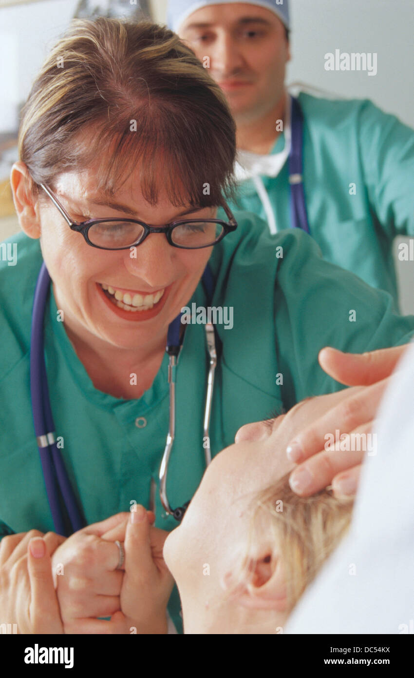 Medical staff visiting patient Stock Photo - Alamy