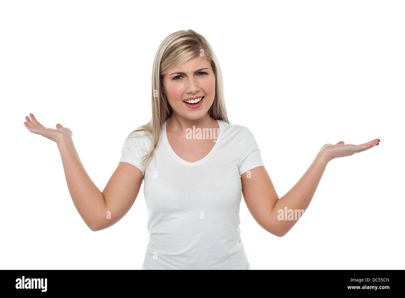 Confused young woman. Mixed expression Stock Photo - Alamy