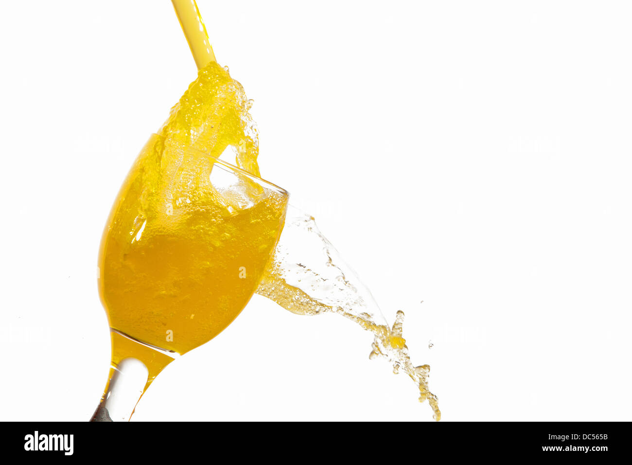 Splash orange juice falling glass hi-res stock photography and images ...