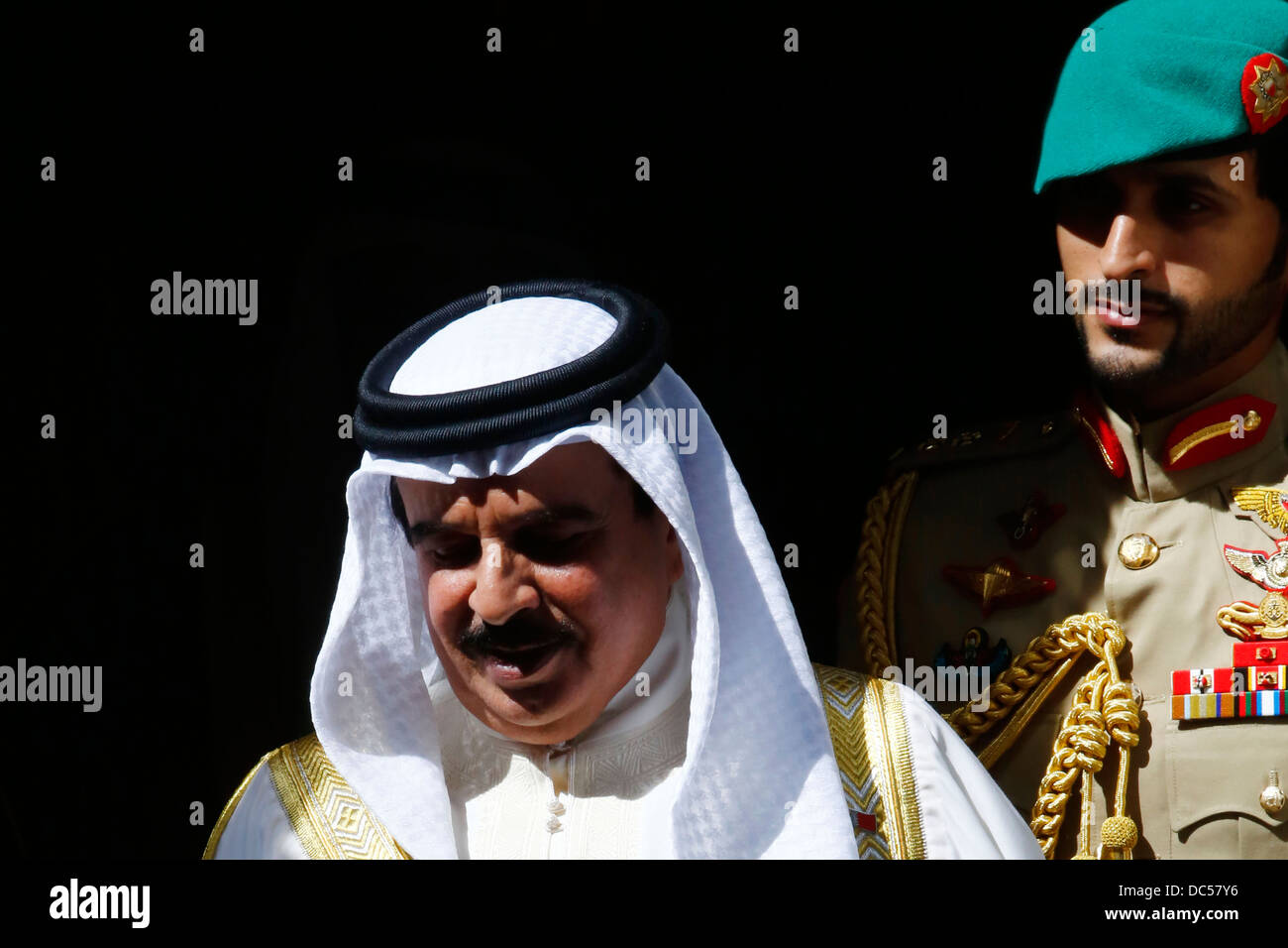 Bahrain's King Hamad bin Isa al-Khalifa (L) and his son Nasser bin ...