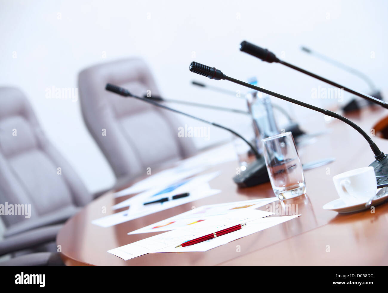 Conference hall with microphones Stock Photo - Alamy
