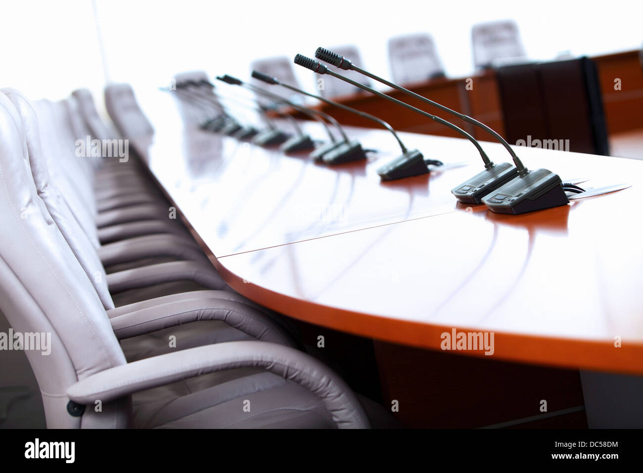 Conference hall with microphones Stock Photo - Alamy