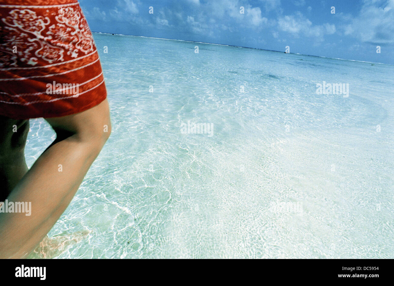 Woman´s legs in ocean. Cook Islands Stock Photo - Alamy