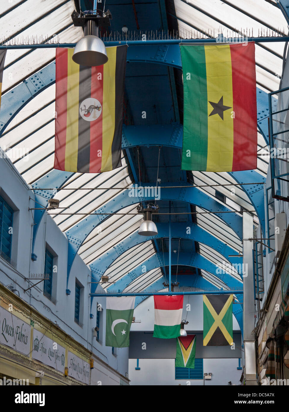 Flags from various countries at the refurbished Brixton Market, a ...