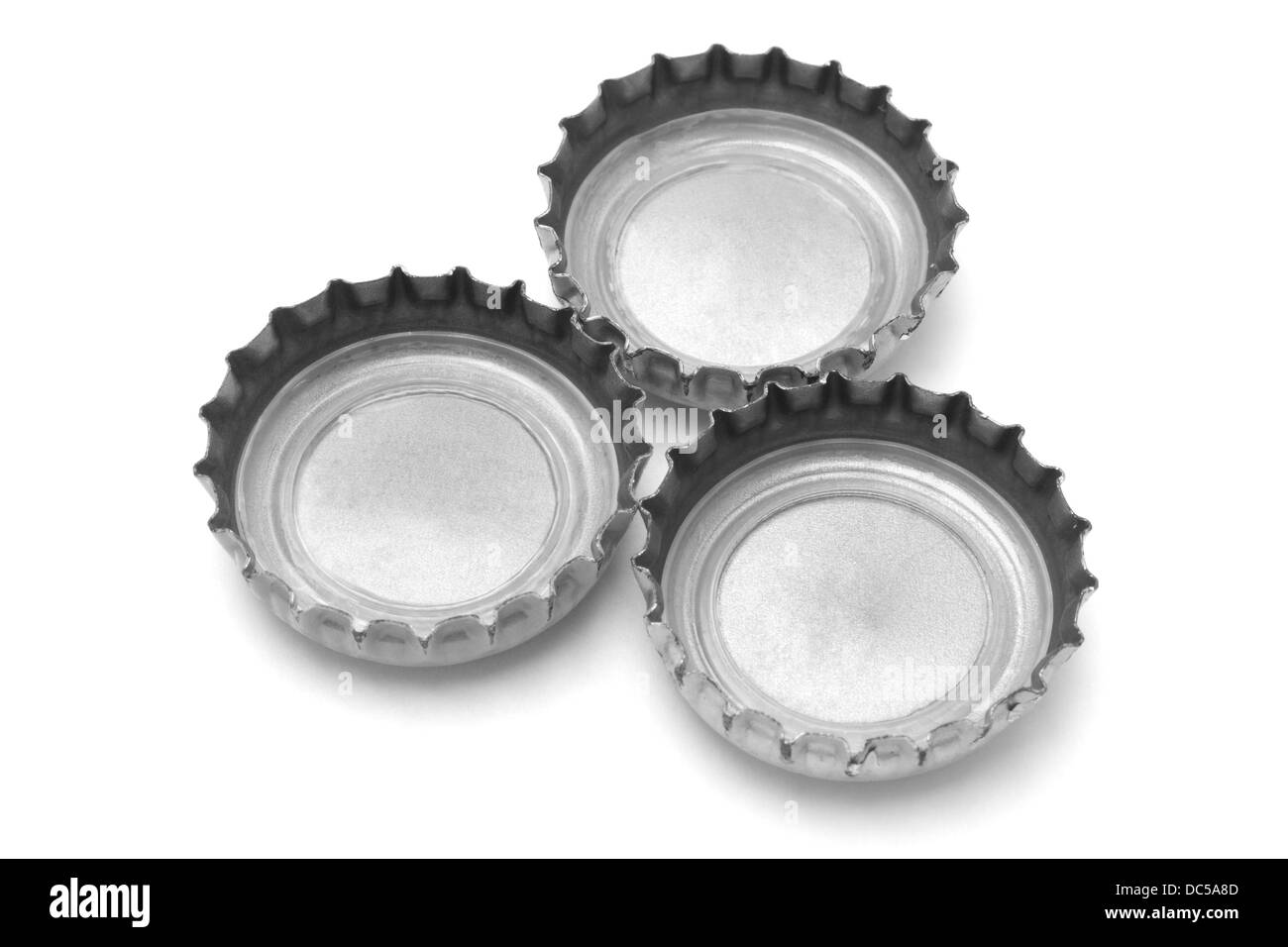 Metal Bottle Caps On White Background Stock Photo - Alamy
