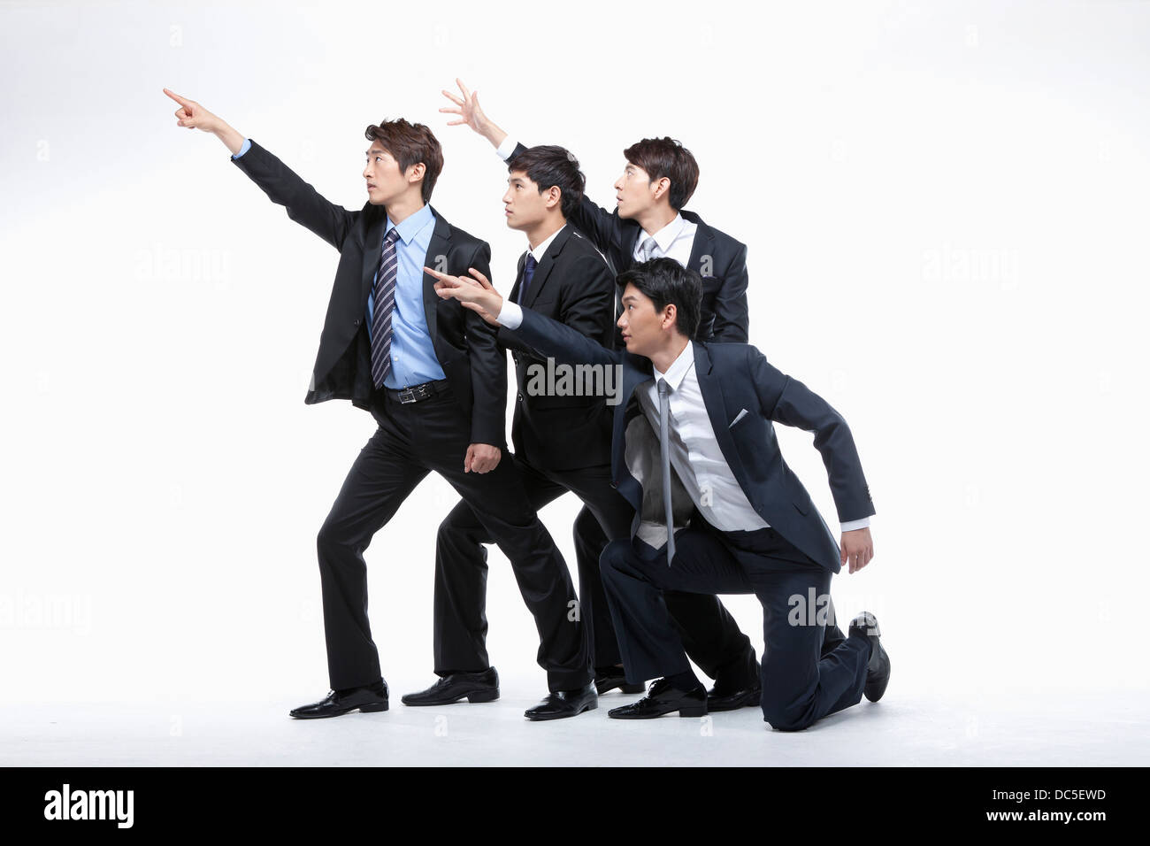 businessmen trying to reach something Stock Photo - Alamy