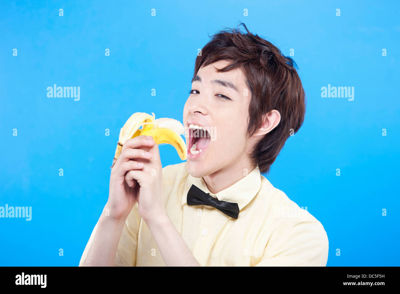 Eating banana korean hi-res stock photography and images - Alamy