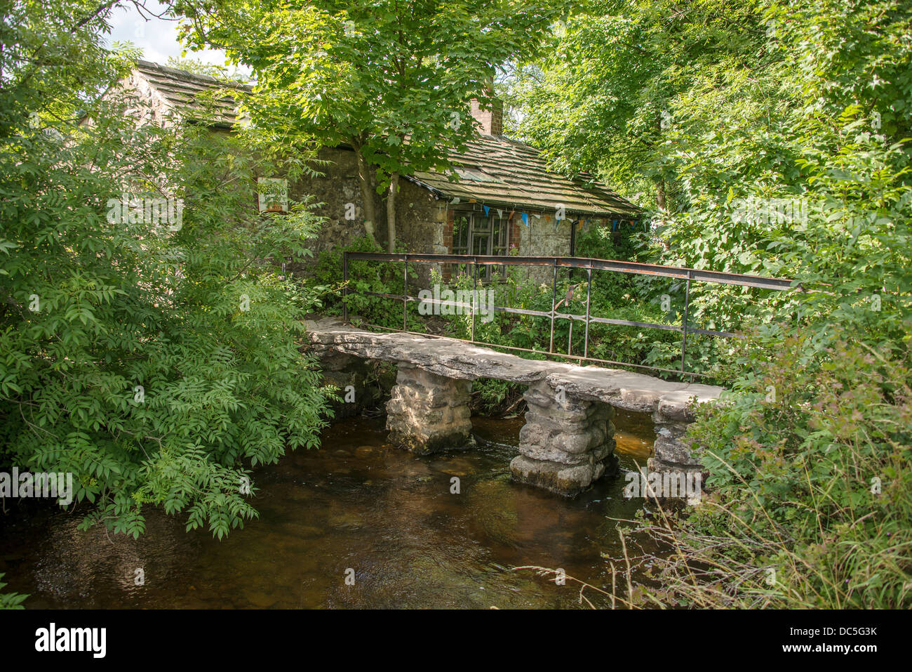Ancient stone bridge beside the Smithy in Malham North Yorkshire Stock ...