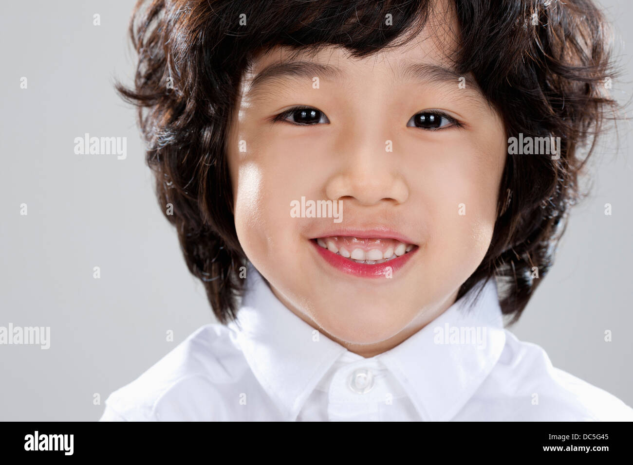 close up shot of a boy smiling Stock Photo - Alamy