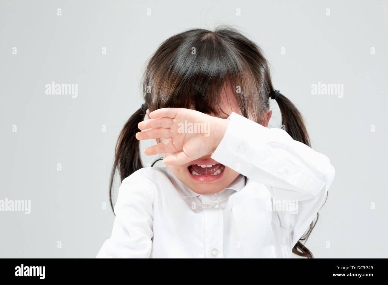 close up shot of a girl crying Stock Photo - Alamy