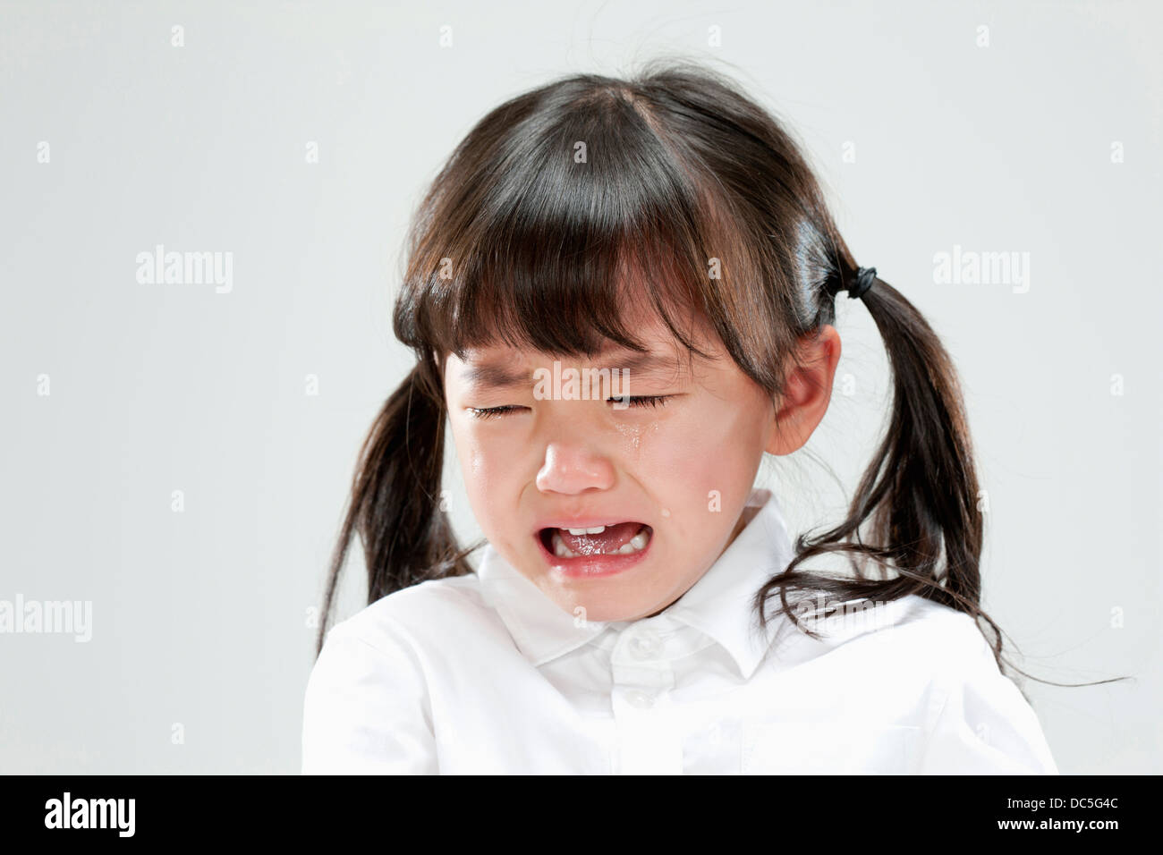 close up shot of a girl crying Stock Photo - Alamy