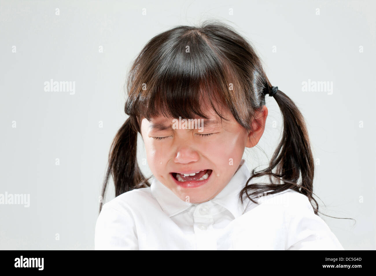 Crying asian student hi-res stock photography and images - Alamy