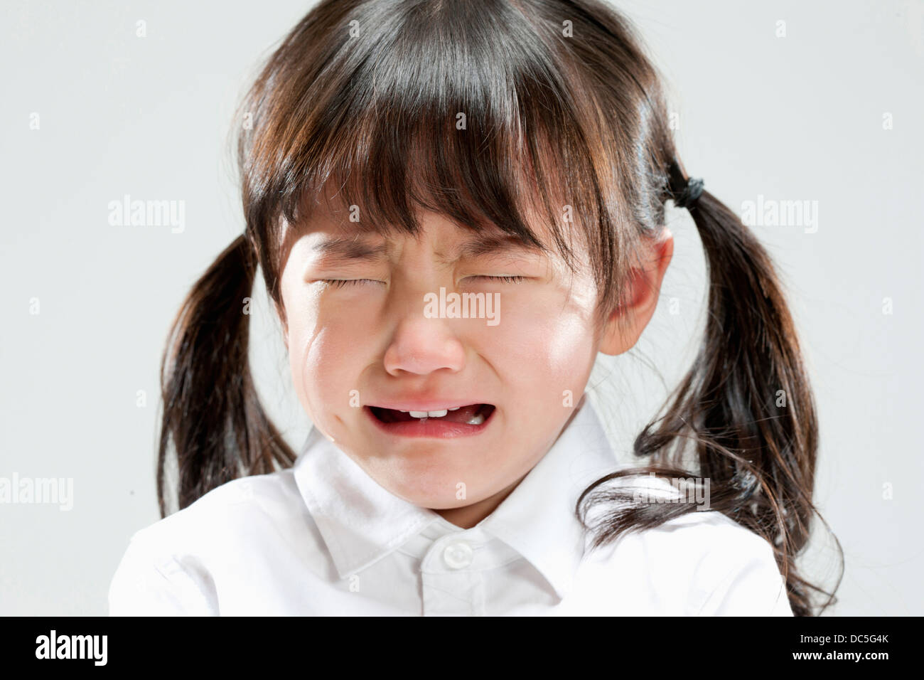 close up shot of a girl crying Stock Photo - Alamy