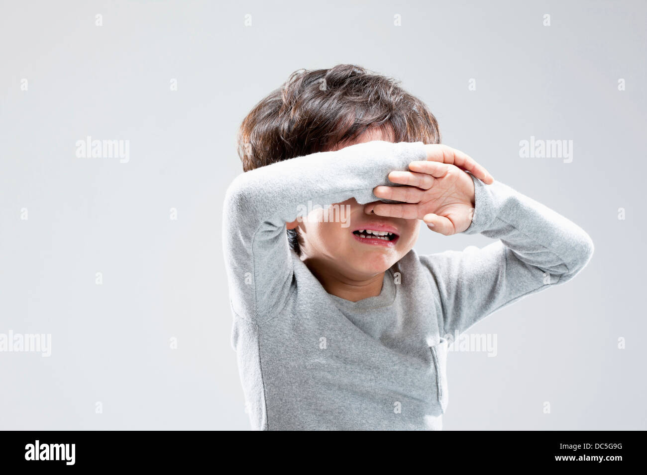 close up shot of a boy crying Stock Photo - Alamy