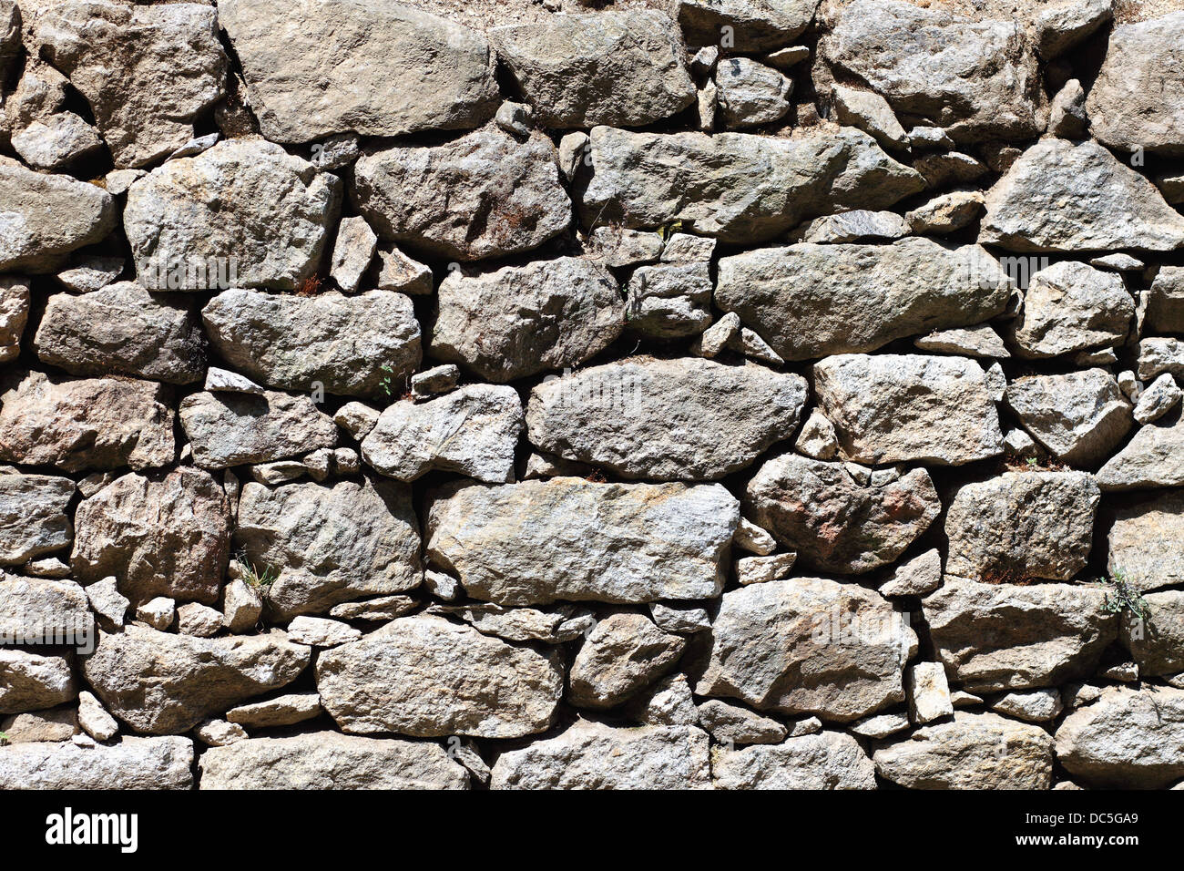 Natural pattern of a stone wall Stock Photo - Alamy