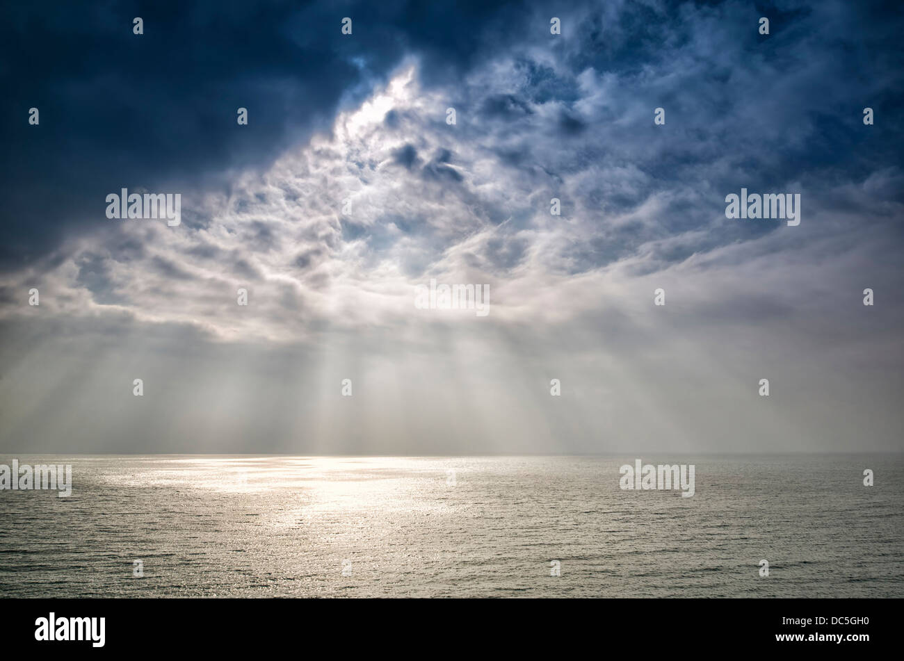 Beautiful sun beams over ocean Stock Photo - Alamy