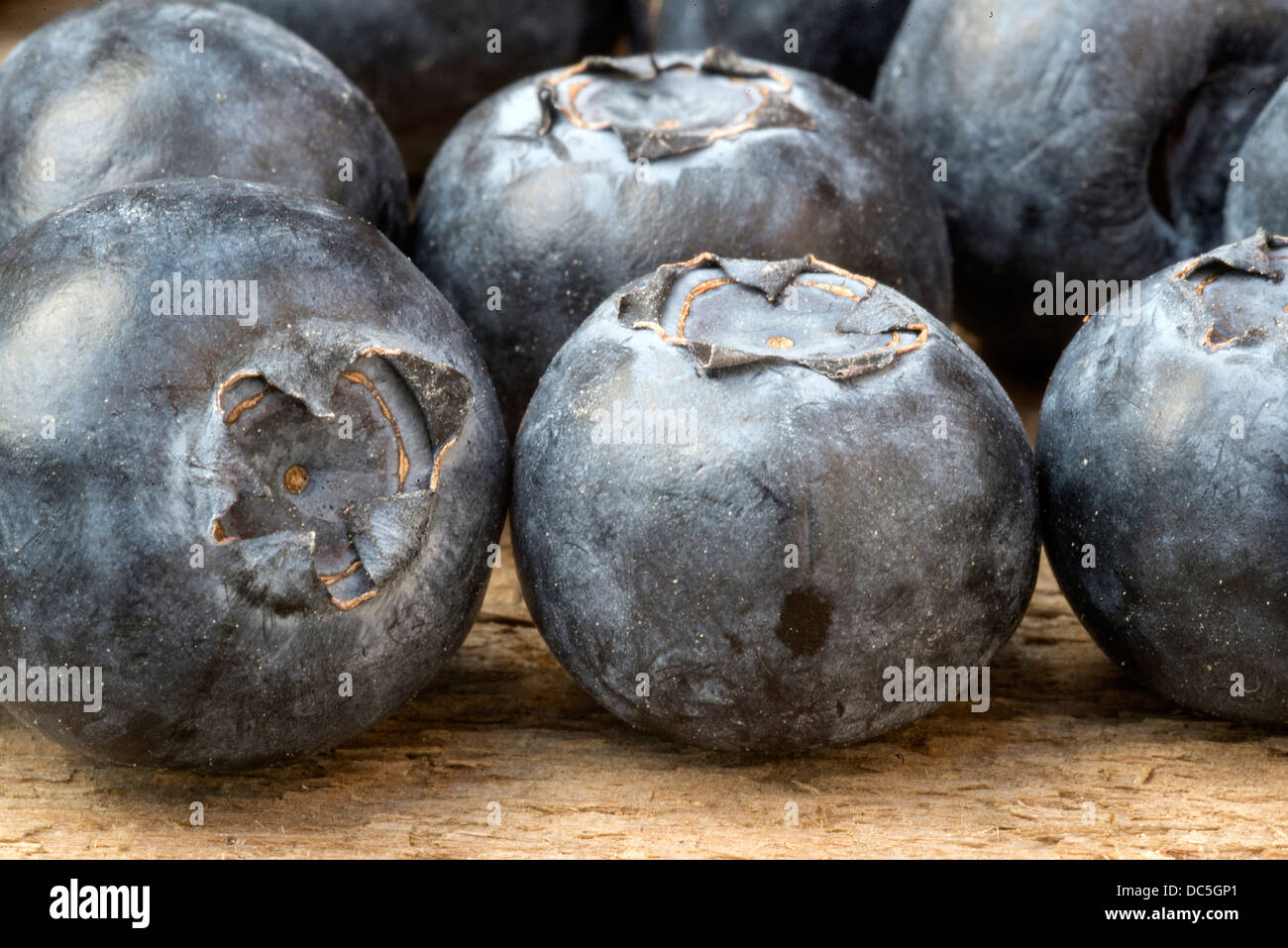 Fresh Summer blueberries on rustic wooden background Stock Photo - Alamy