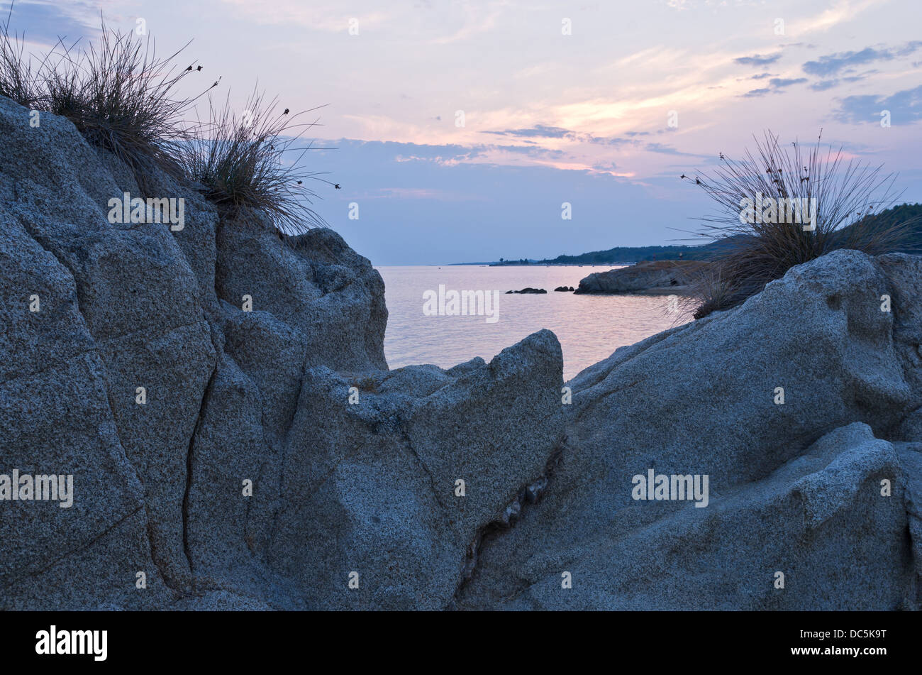 Beach sunset rock formation romantic hi-res stock photography and ...
