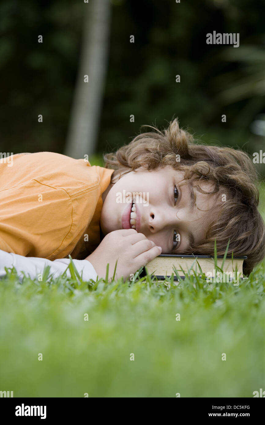 Child laying on ground hi-res stock photography and images - Alamy